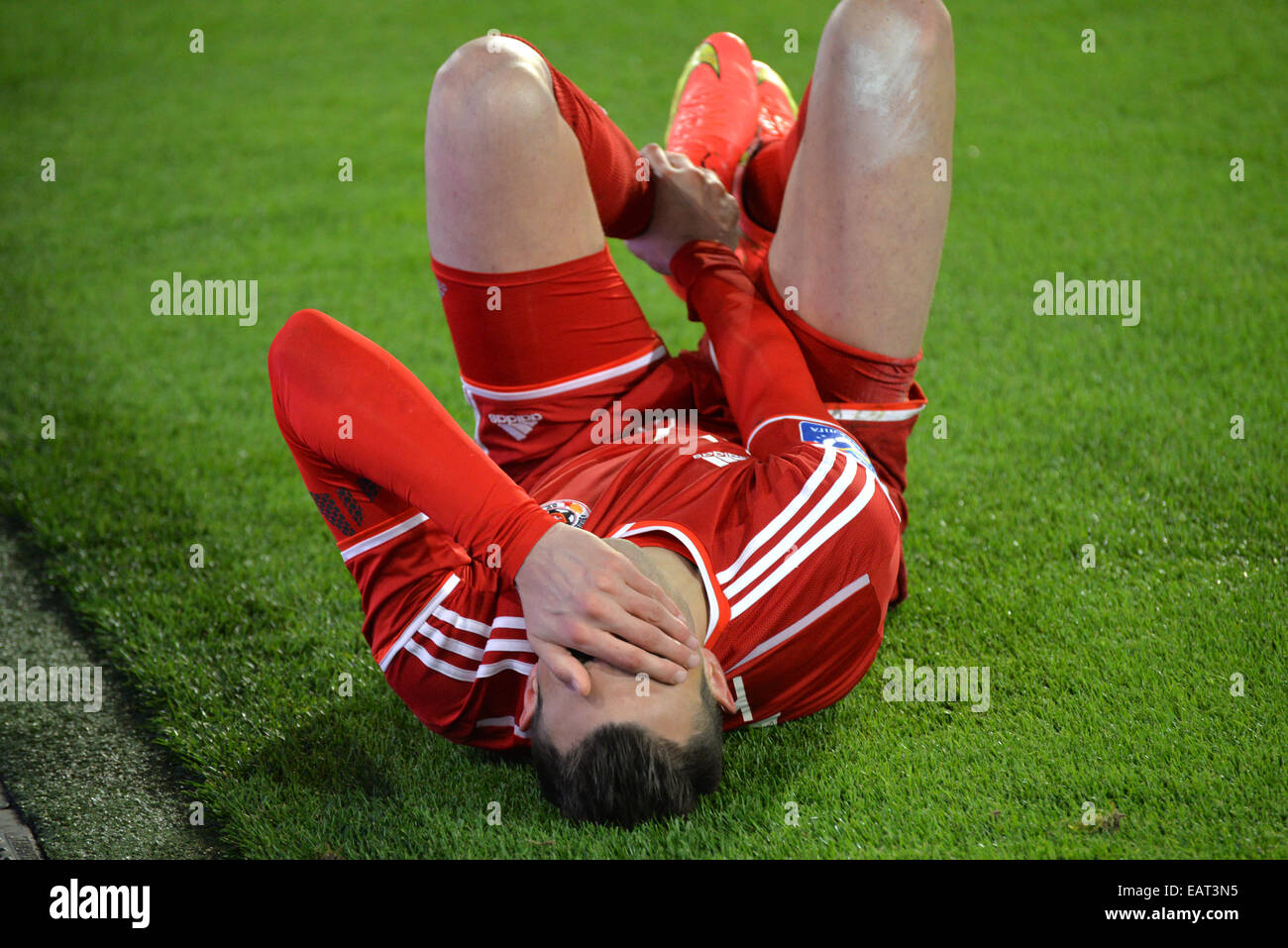 Injured soccer player with coach hi-res stock photography and images ...