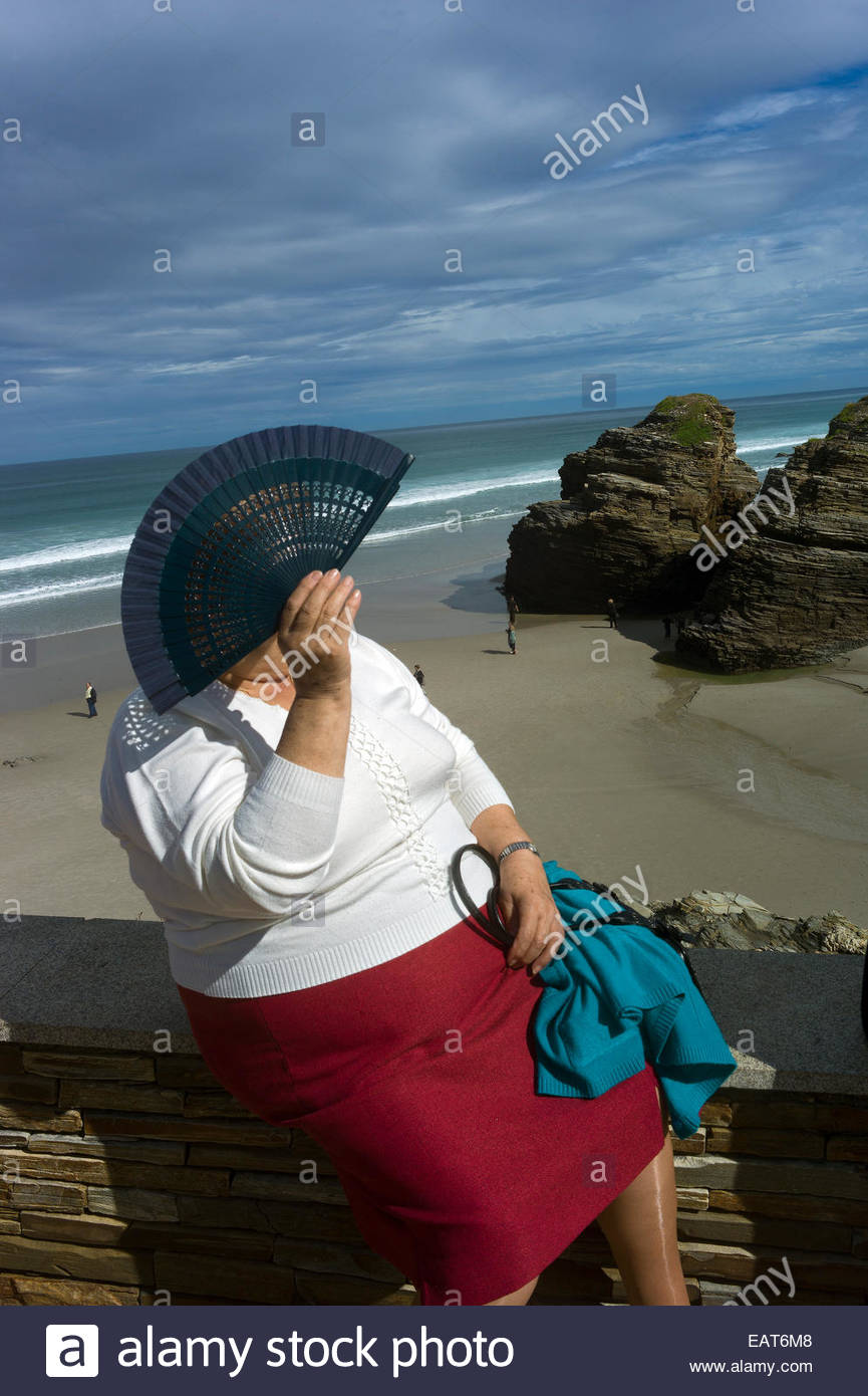 Woman Fanning Herself Stock Photos & Woman Fanning Herself Stock Images ...