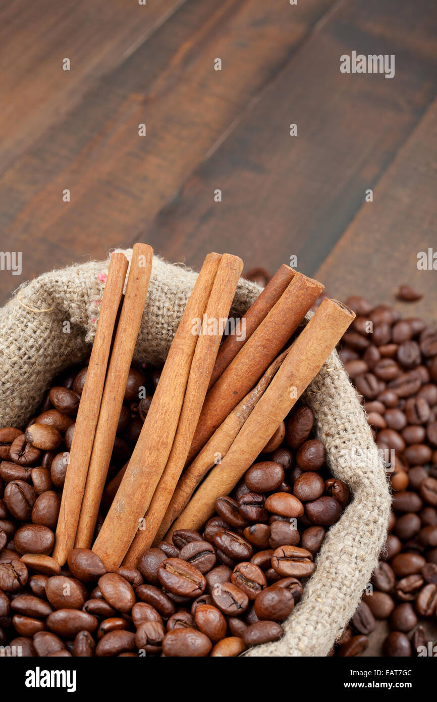 sack with coffee beans and cinnamon sticks Stock Photo - Alamy