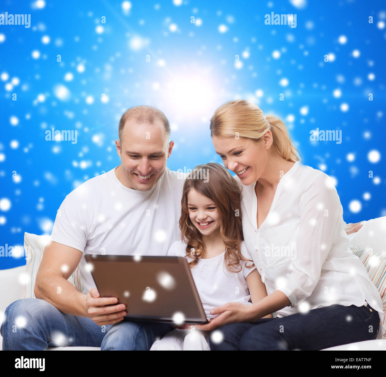smiling family with laptop Stock Photo - Alamy