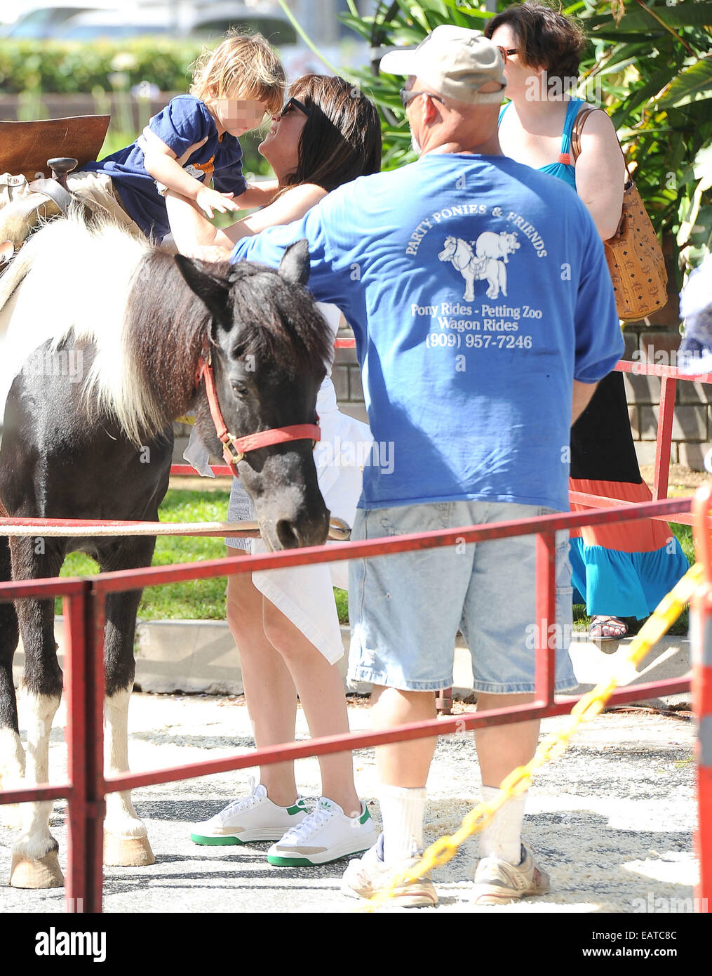 Selma Blair takes son Arthur Bleick on a pony ride at the Farmers ...