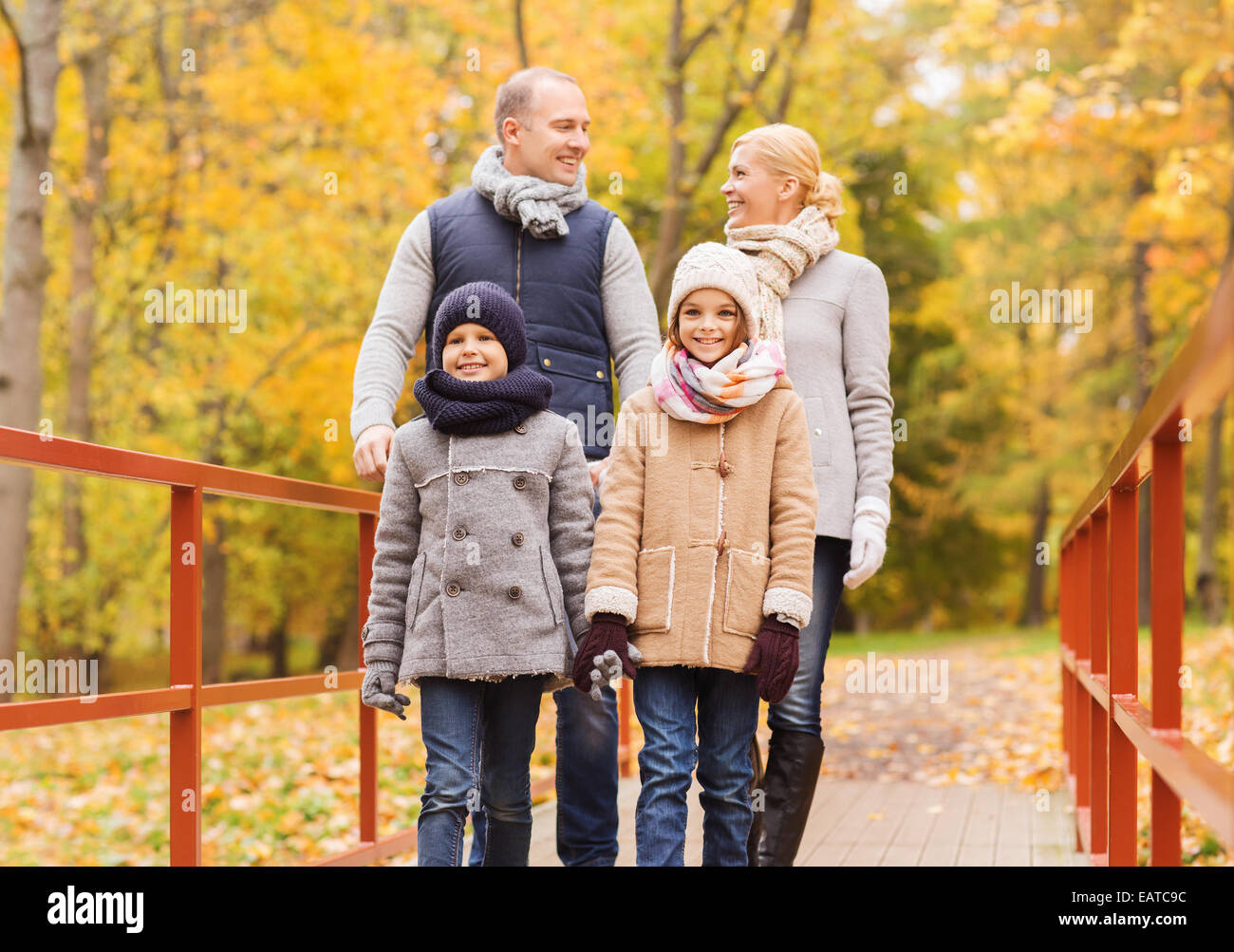 happy family in autumn park Stock Photo - Alamy