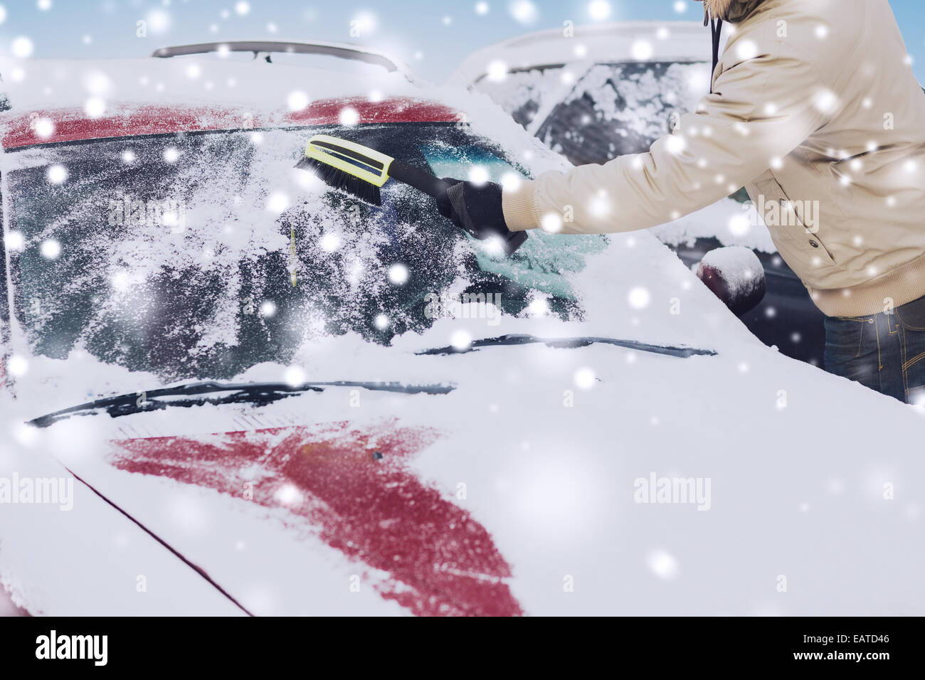 Person wiping snow from car hi-res stock photography and images - Alamy