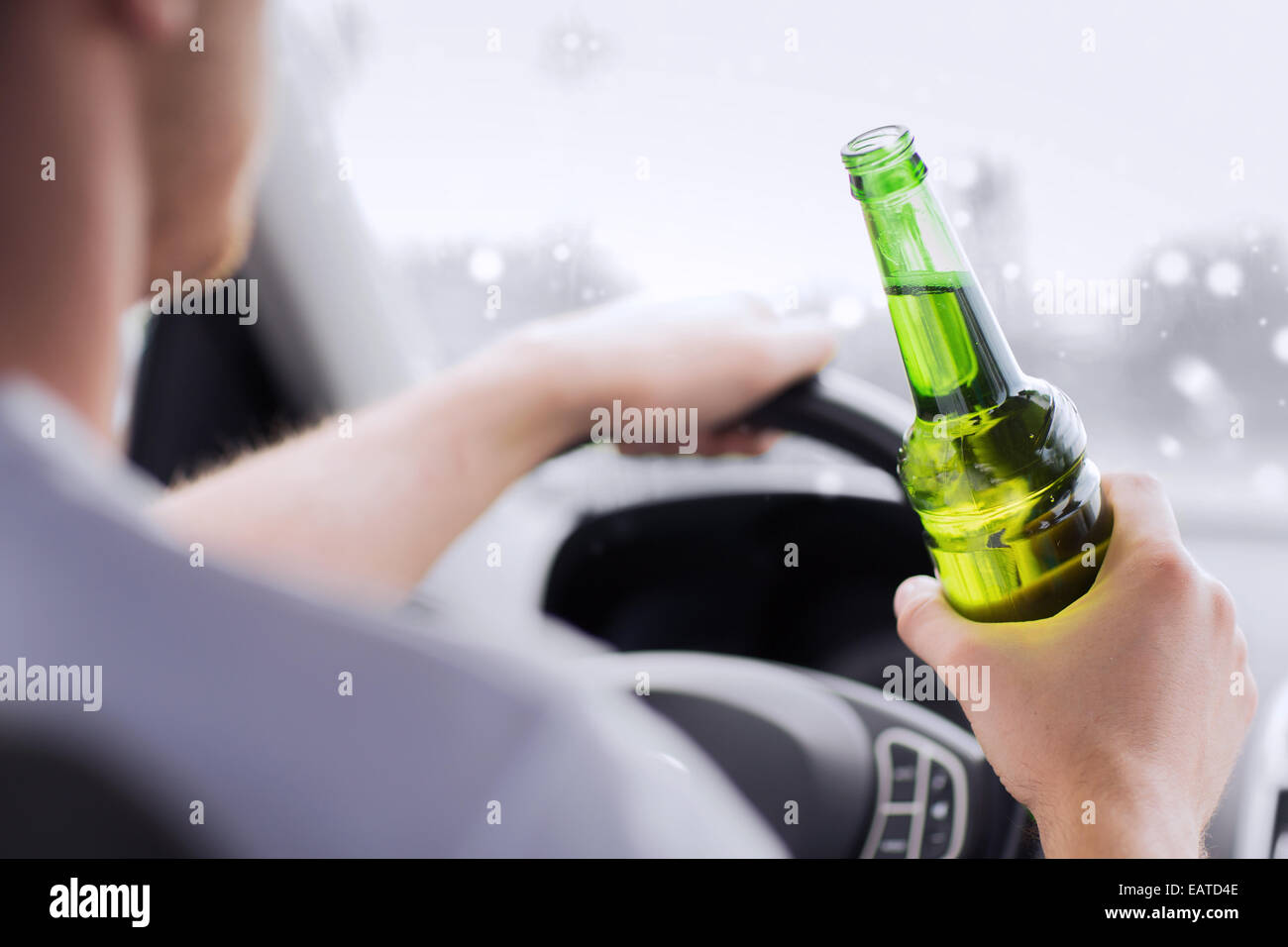 close up of man drinking alcohol while driving car Stock Photo - Alamy