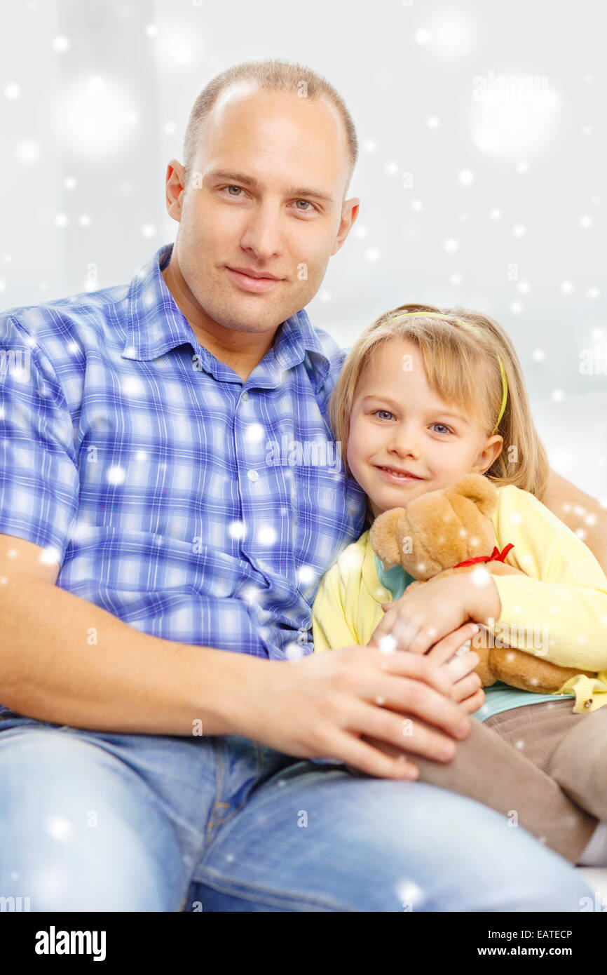 smiling father and daughter with teddy bear Stock Photo - Alamy
