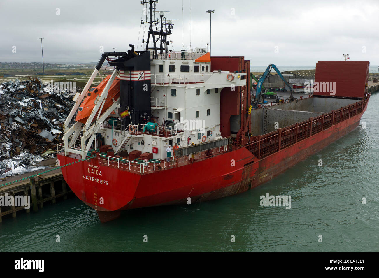 Scrap metal being loaded onto ship cargo vessel, Newhaven, UK Stock ...