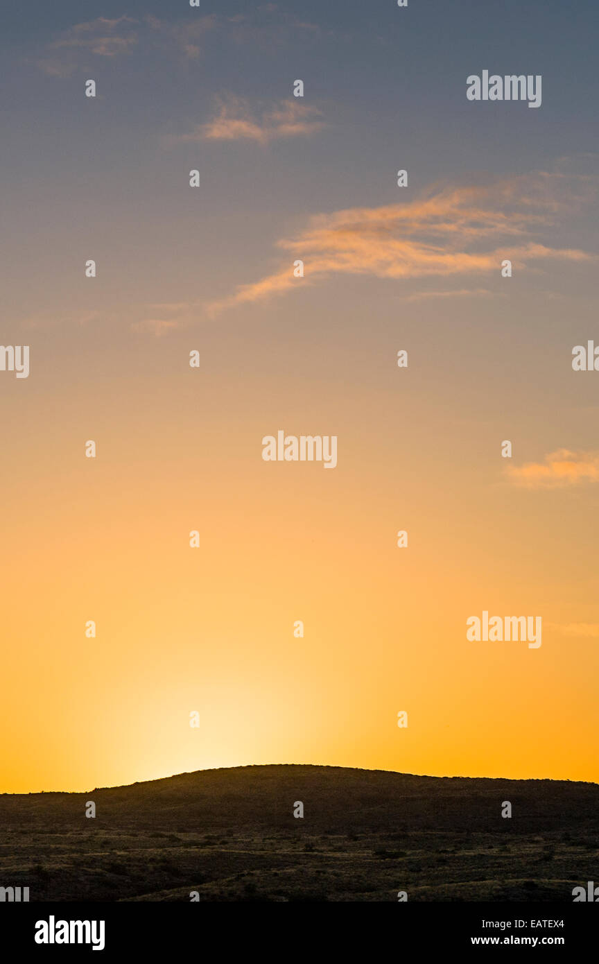 Dawn rising over an arid rocky coastal desert in Big Sky Country Stock ...