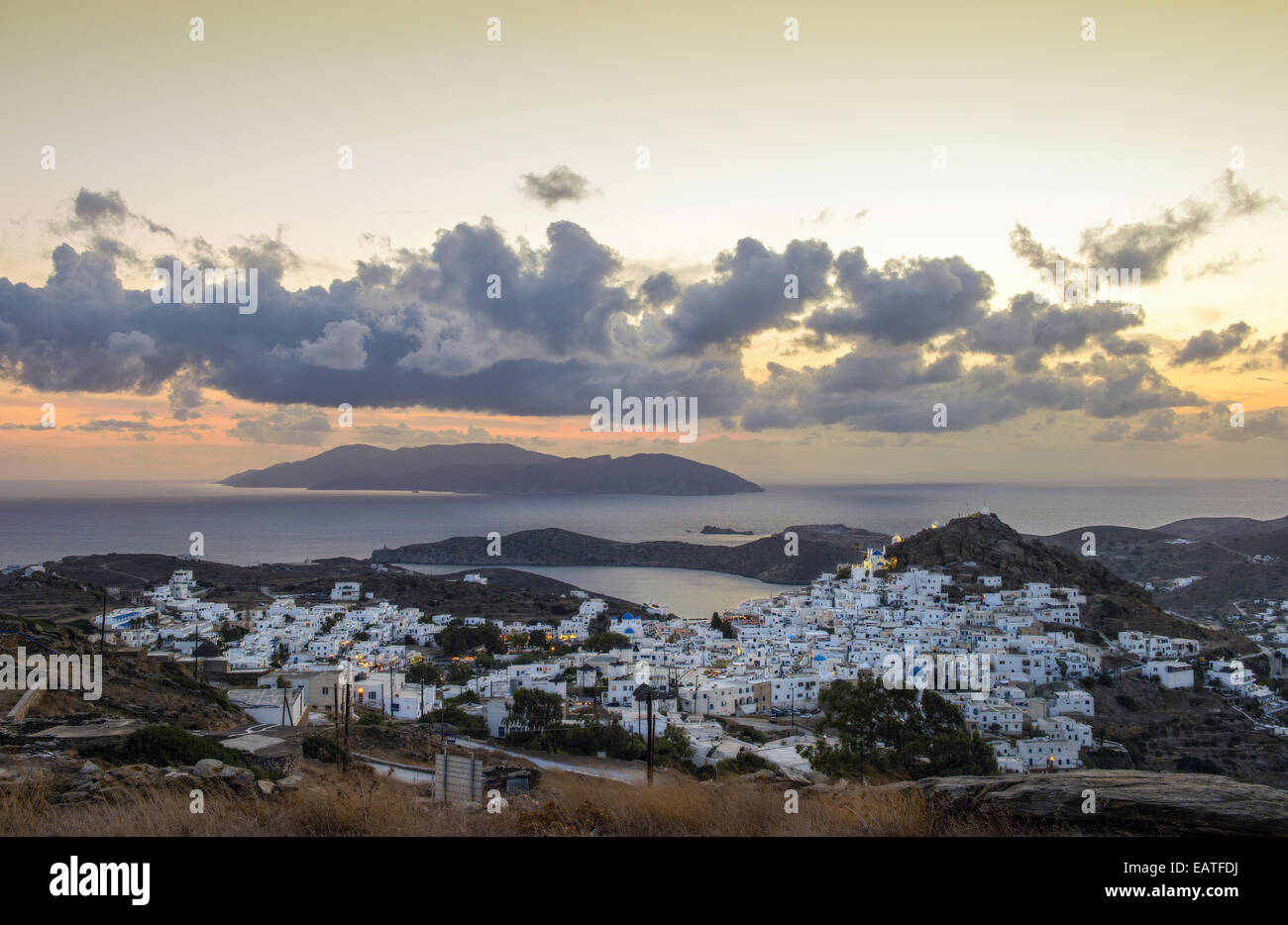 Panoramic view of Chora (Hora) village at sunset overlooking the Aegean ...