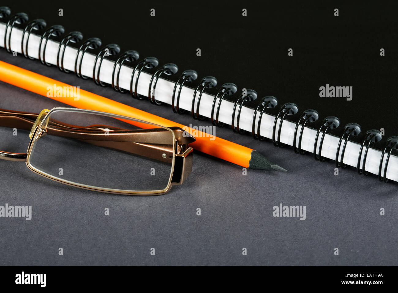 Pencil and glasses hi-res stock photography and images - Alamy