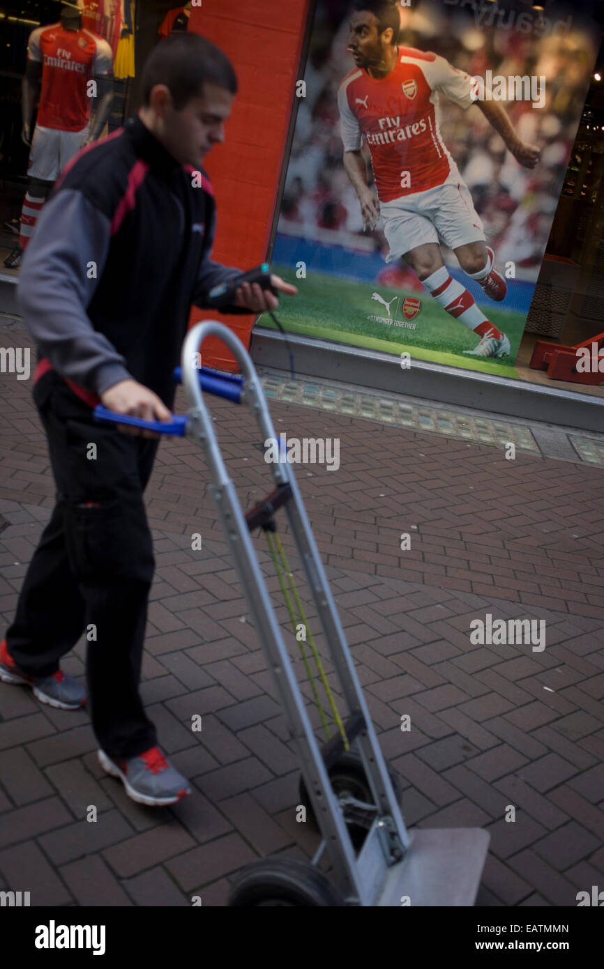 Diagonal angle of Arsenal footballer and trolley, in Carnaby Street ...