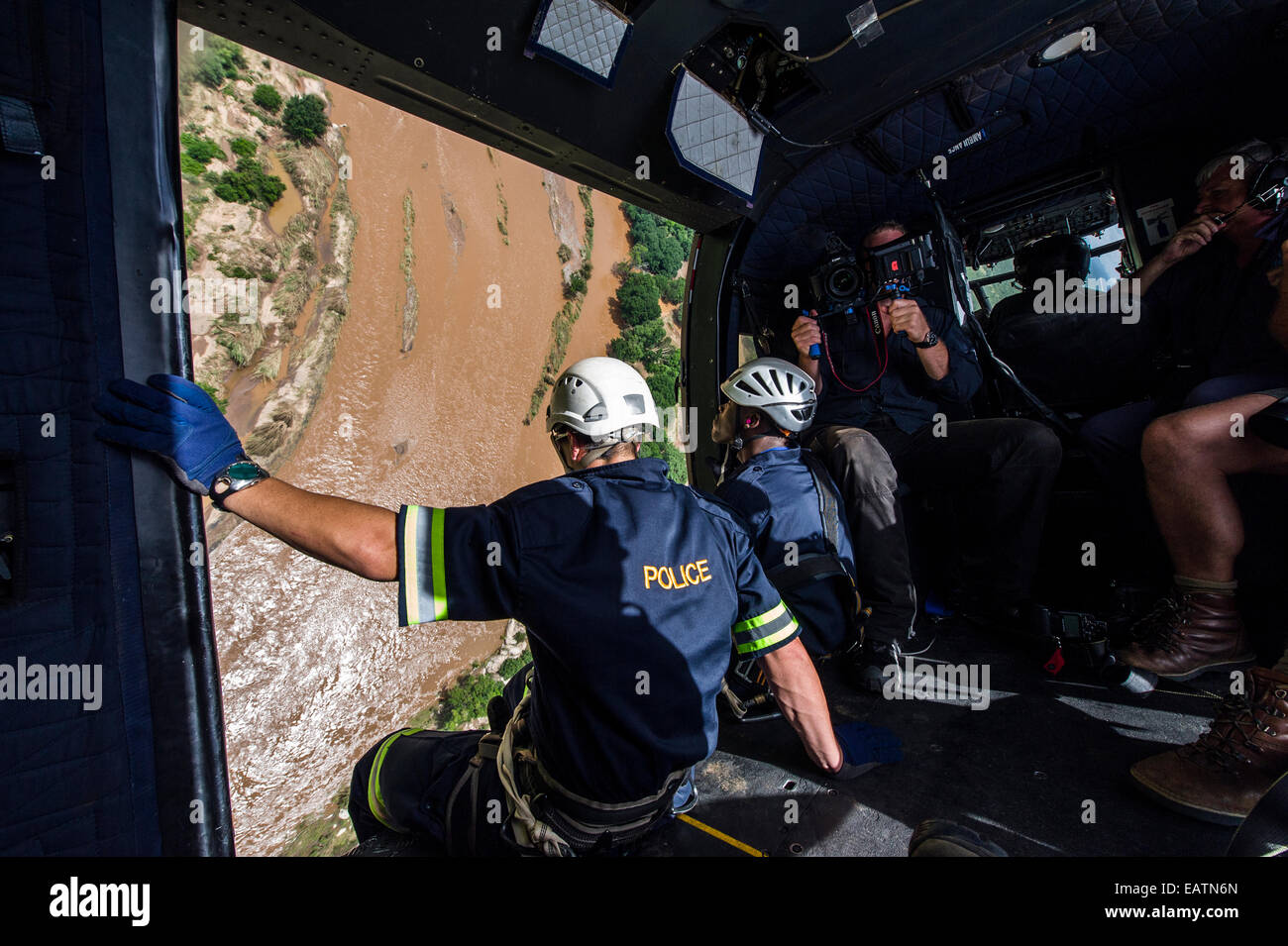 Airforce and police officers search for survivors trapped in floods ...