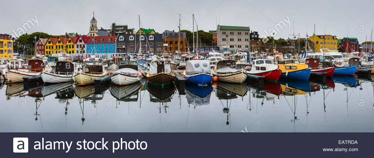View of a colorful harbor in Torshavn's historic Tinganes District ...