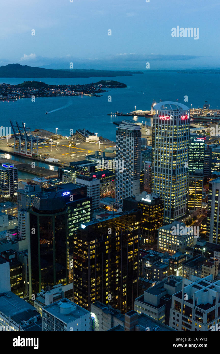 The neon lights of the Auckland city skyline overing Half Moon Bay ...