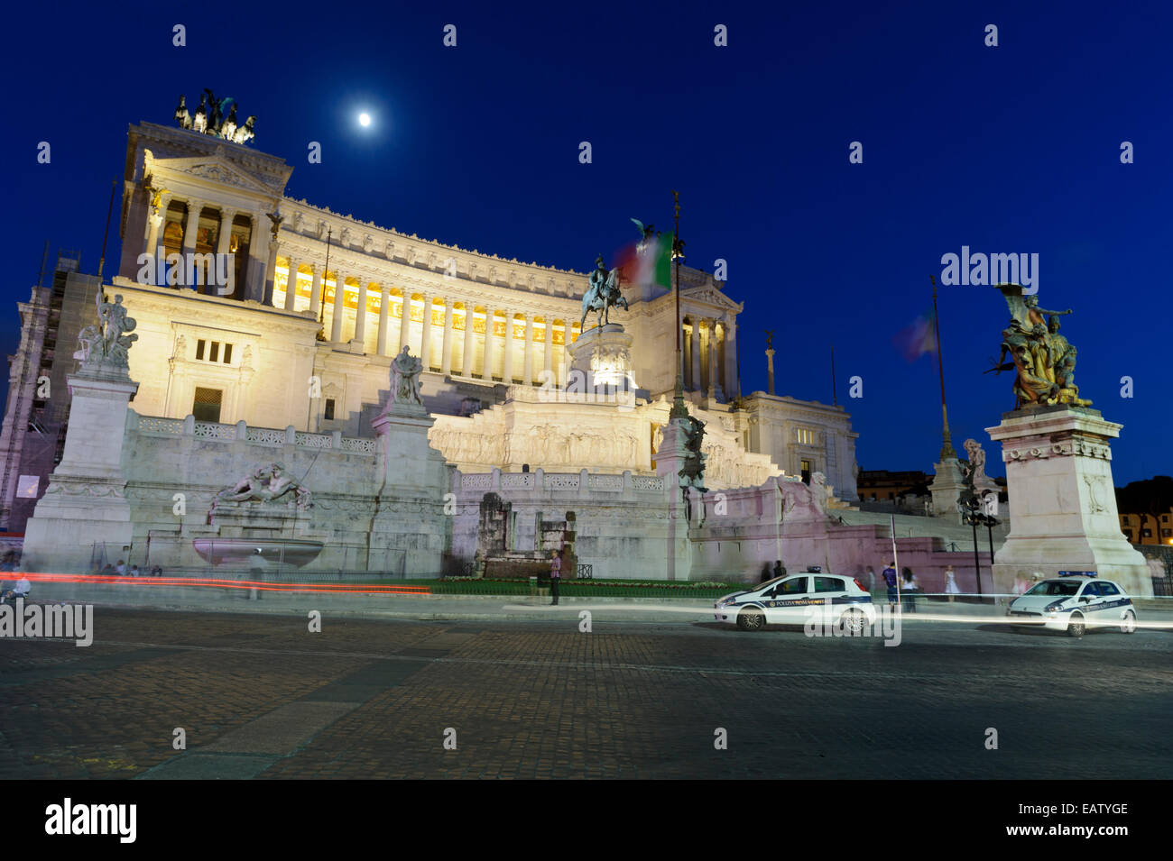 The Victor Emmanuel white building by night in Rome, Italy Stock Photo ...