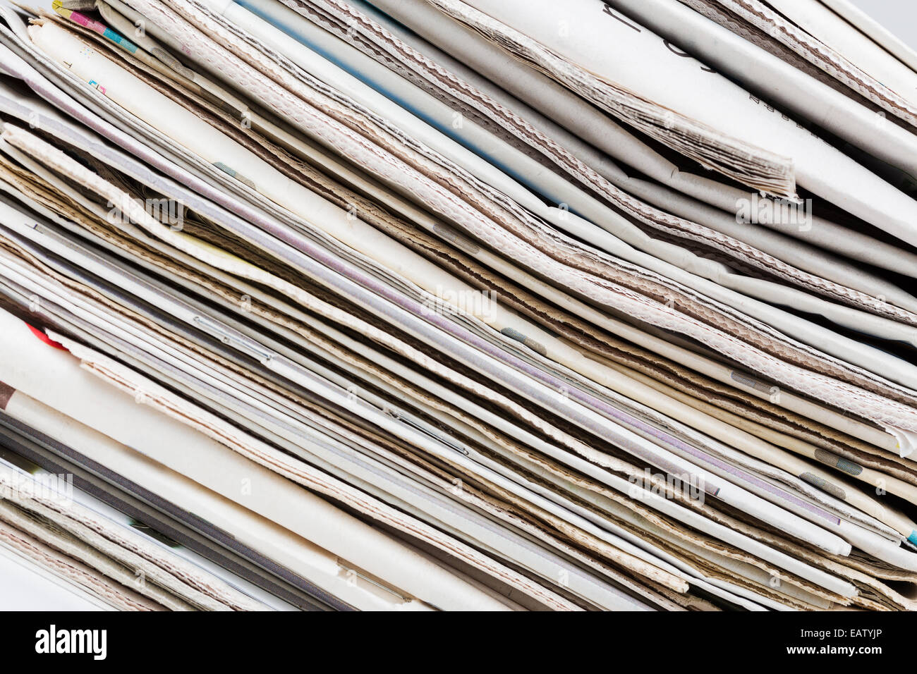 Stack of newspapers Stock Photo - Alamy