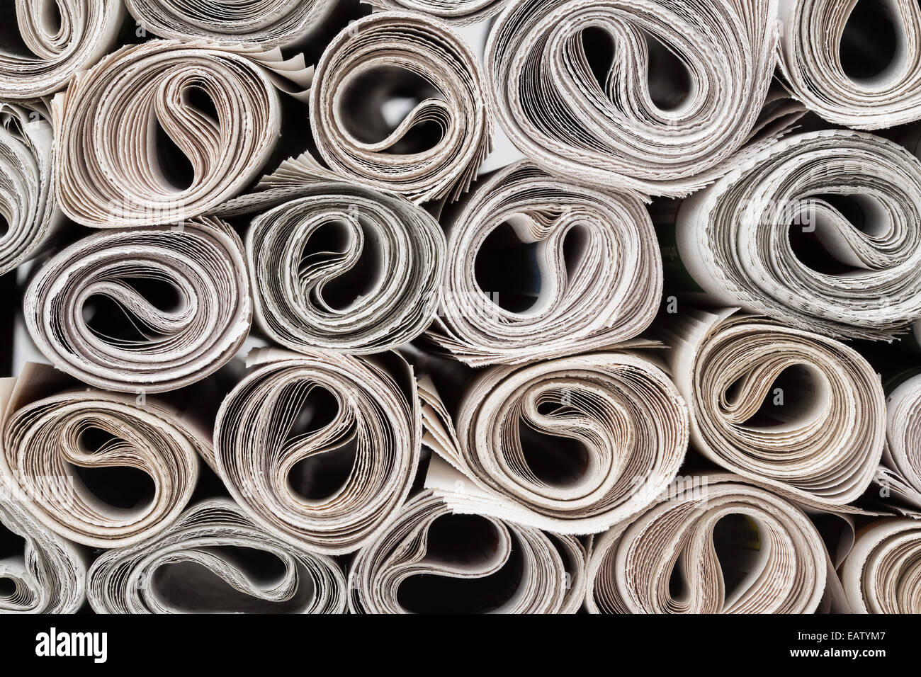 Rolls of newspapers Stock Photo - Alamy