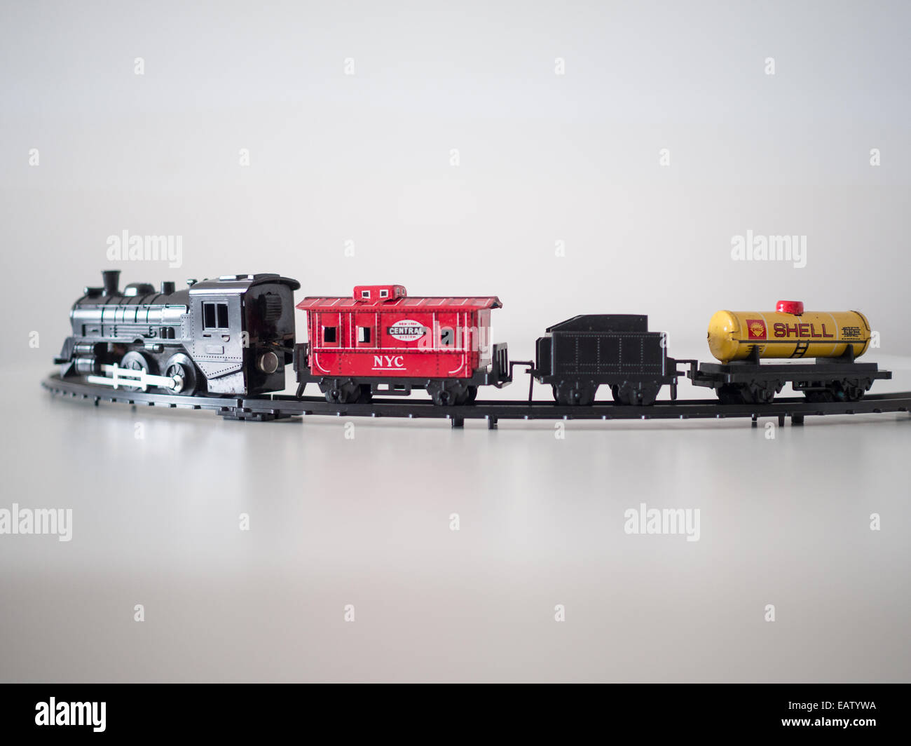 Toy train from the 70's in white background Stock Photo - Alamy