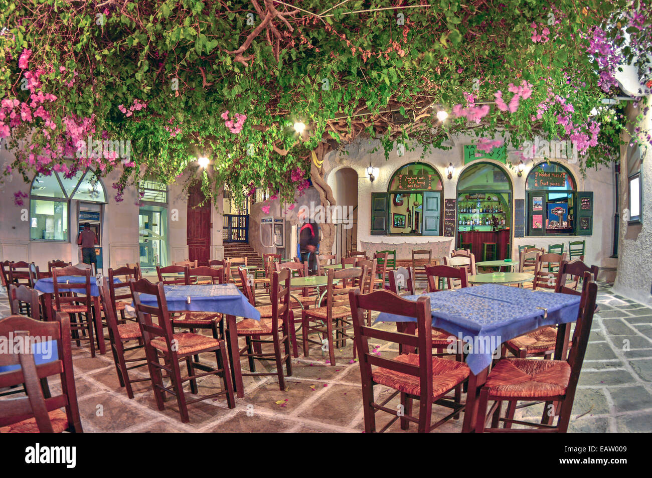 A traditional Greek tavern in the backstreets of Chora (Hora) village ...