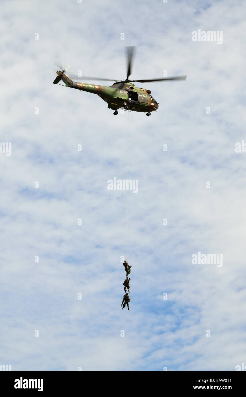 Military helicopter carrying soldiers Stock Photo - Alamy