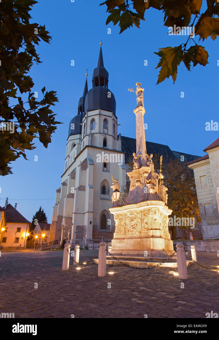 Trnava - The gothic Saint Nicholas church at dusk and st. Joseph ...