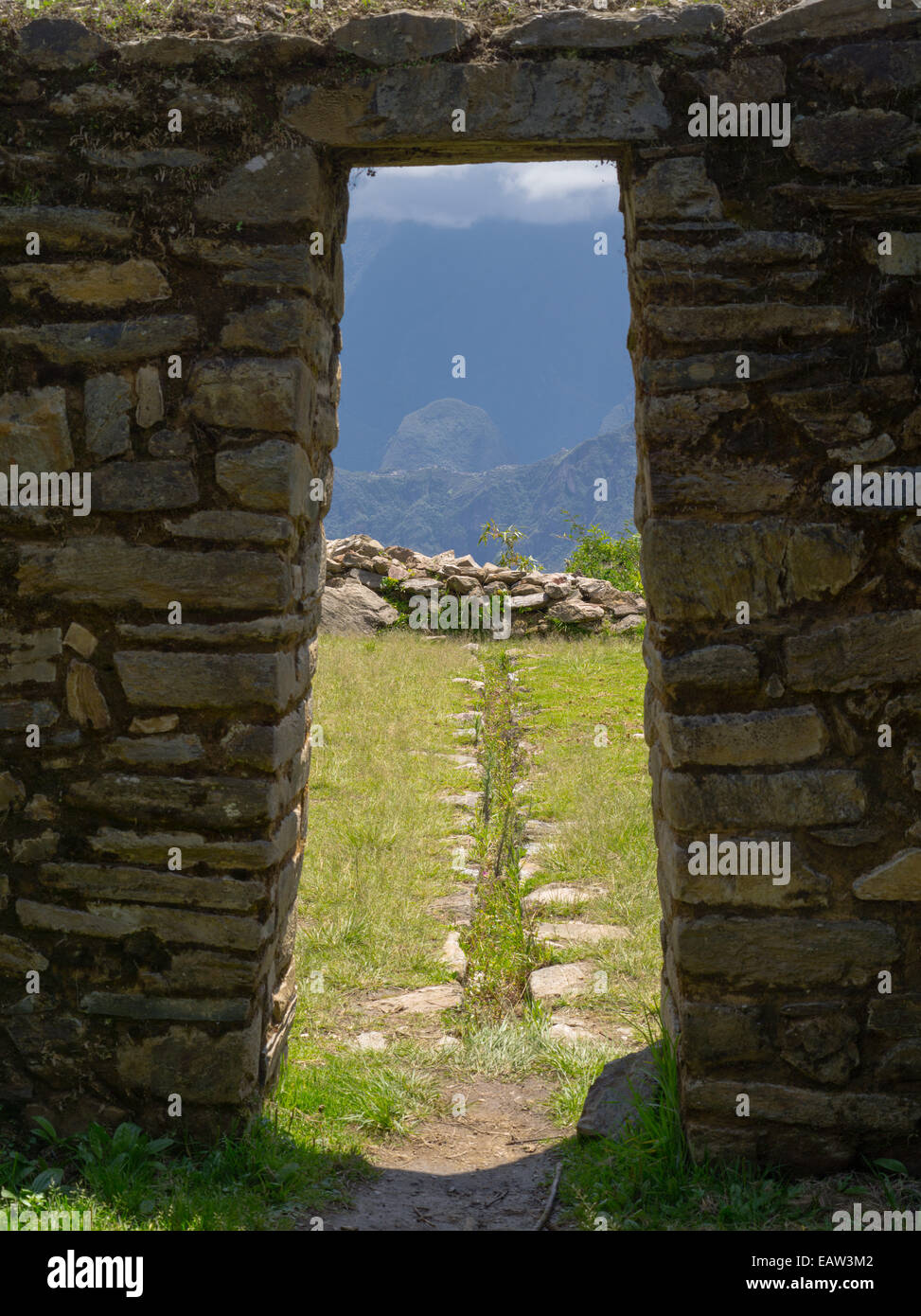 View of Machu Picchu through a doorway from Llactapata, Peru ...
