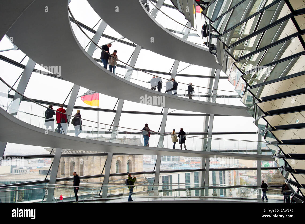 People visiting Reichstag dome in Berlin, Germany. The Reichstag has is ...