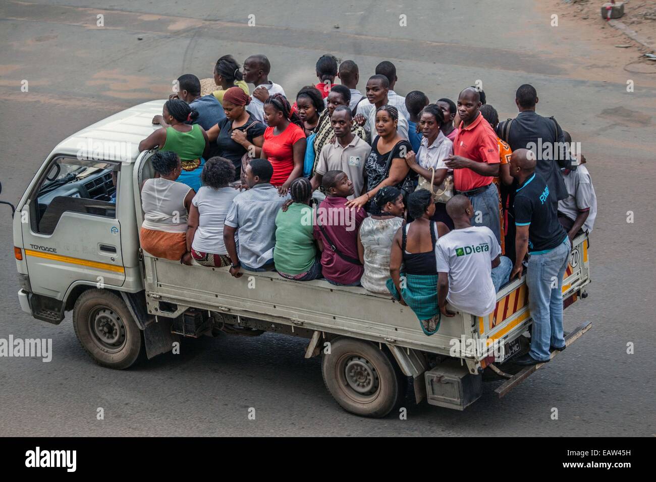 Maputo. 20th Nov, 2014. Local citizens travel on a crowded truck in ...