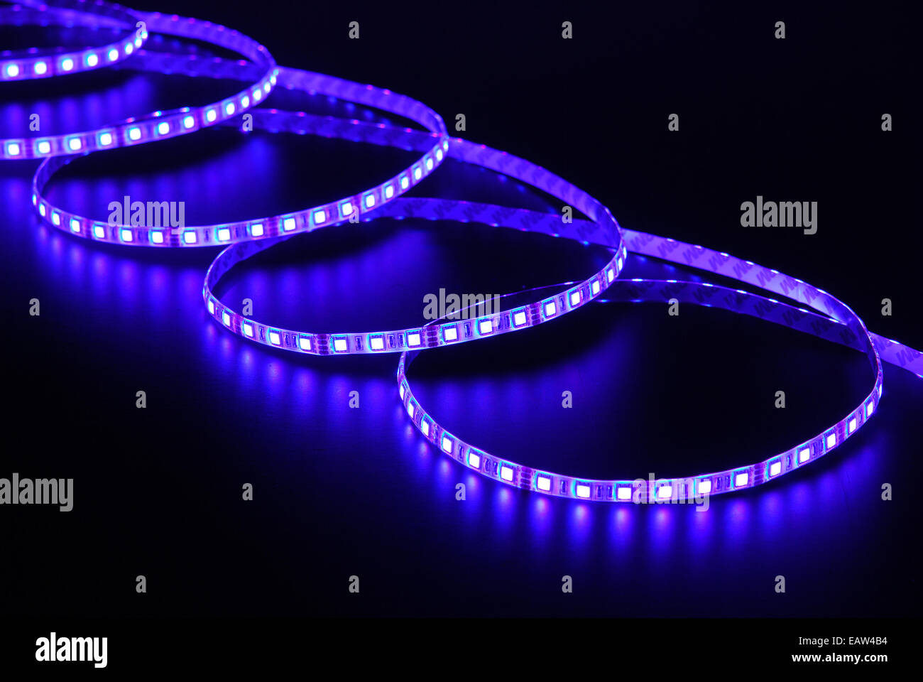 Led stripe is isolated on the black background Stock Photo - Alamy