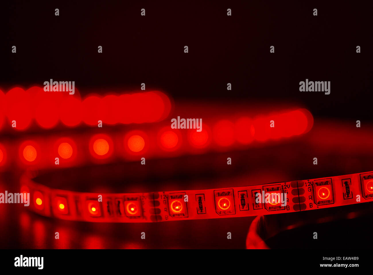 Led stripe is isolated on the black background Stock Photo - Alamy