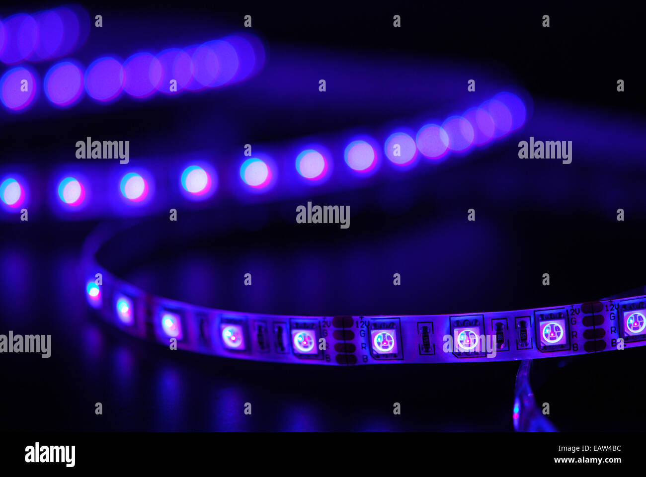 Led stripe is isolated on the black background Stock Photo - Alamy