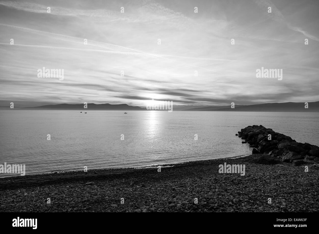 Sea water light clouds reflection Black and White Stock Photos & Images ...