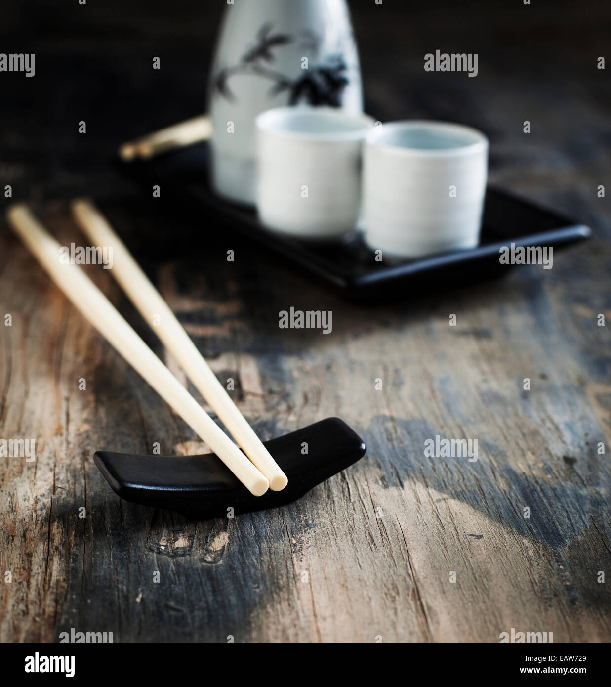 Japanese style table set and sake Stock Photo - Alamy