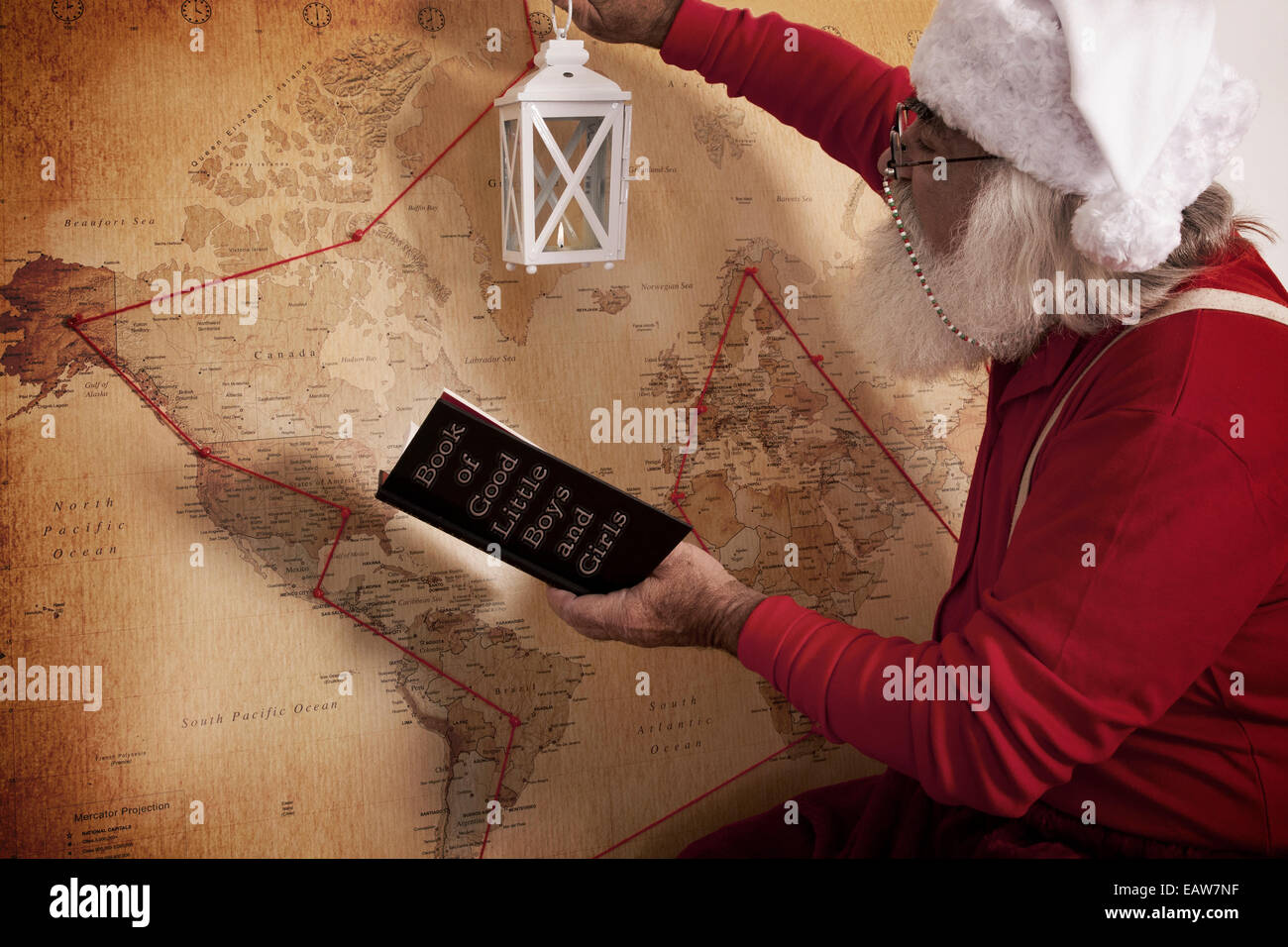 Santa Claus planning his route around the world December 25 Stock Photo ...