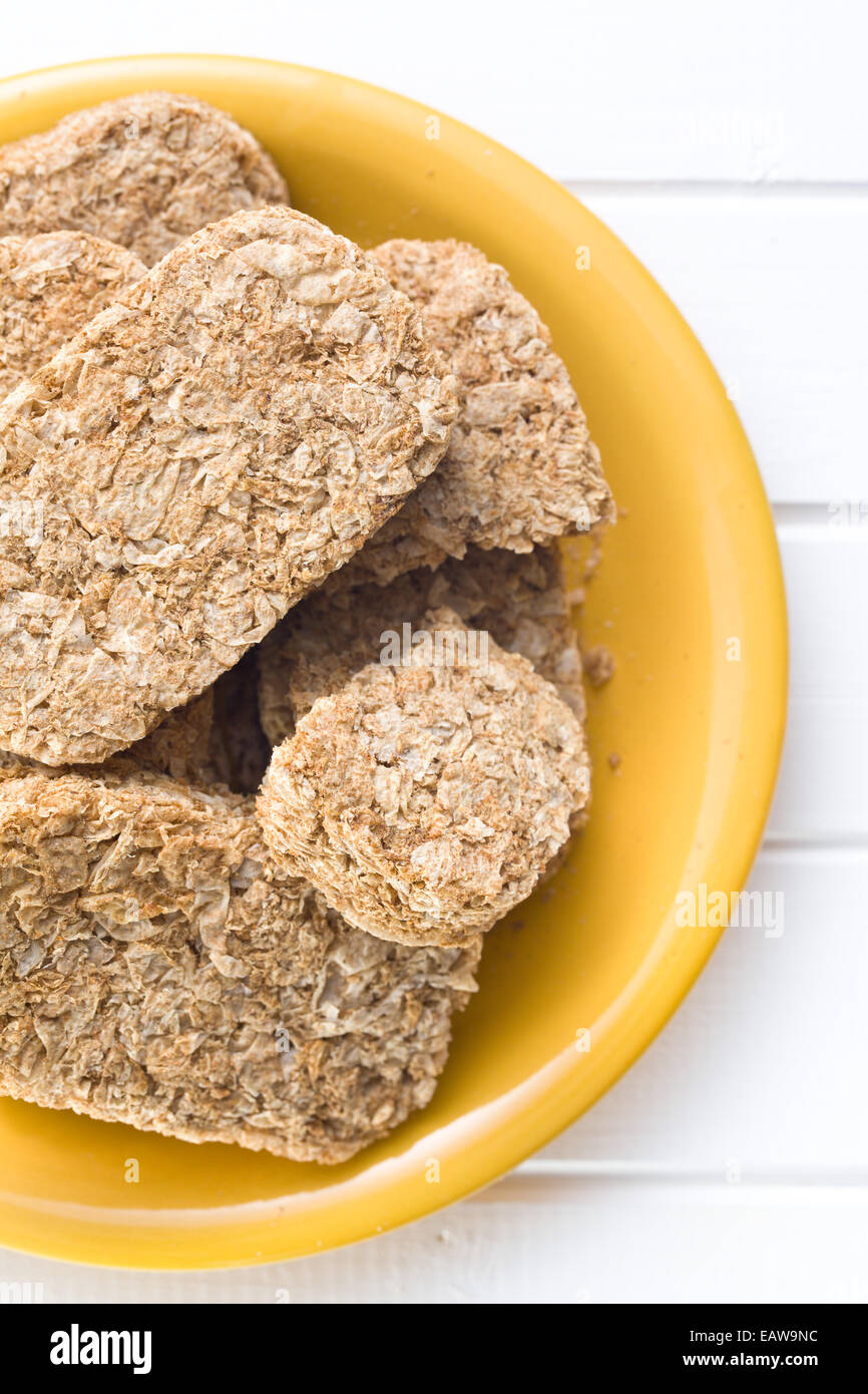 wholemeal crackers on white table Stock Photo - Alamy
