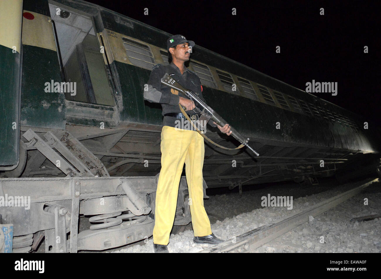 Mustang, Pakistan. 20th Nov, 2014. A Pakistani policeman stands guard ...