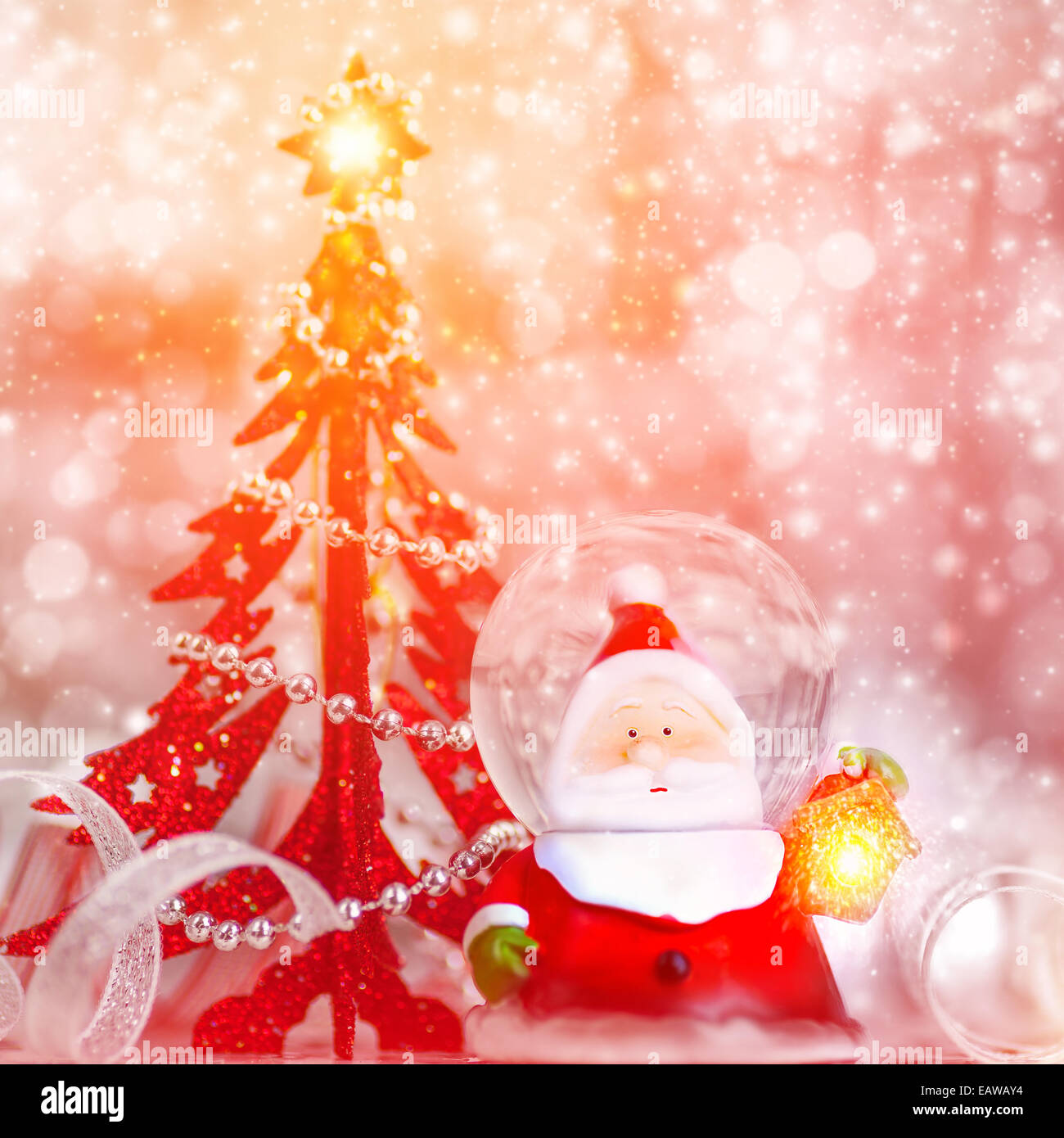 Beautiful Christmas still life, cute little Santa Claus toy and red ...