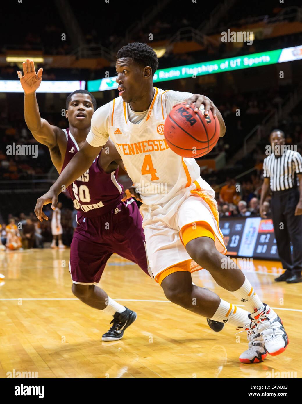 November 20, 2014:Armani Moore #4 of the Tennessee Volunteers drives to ...