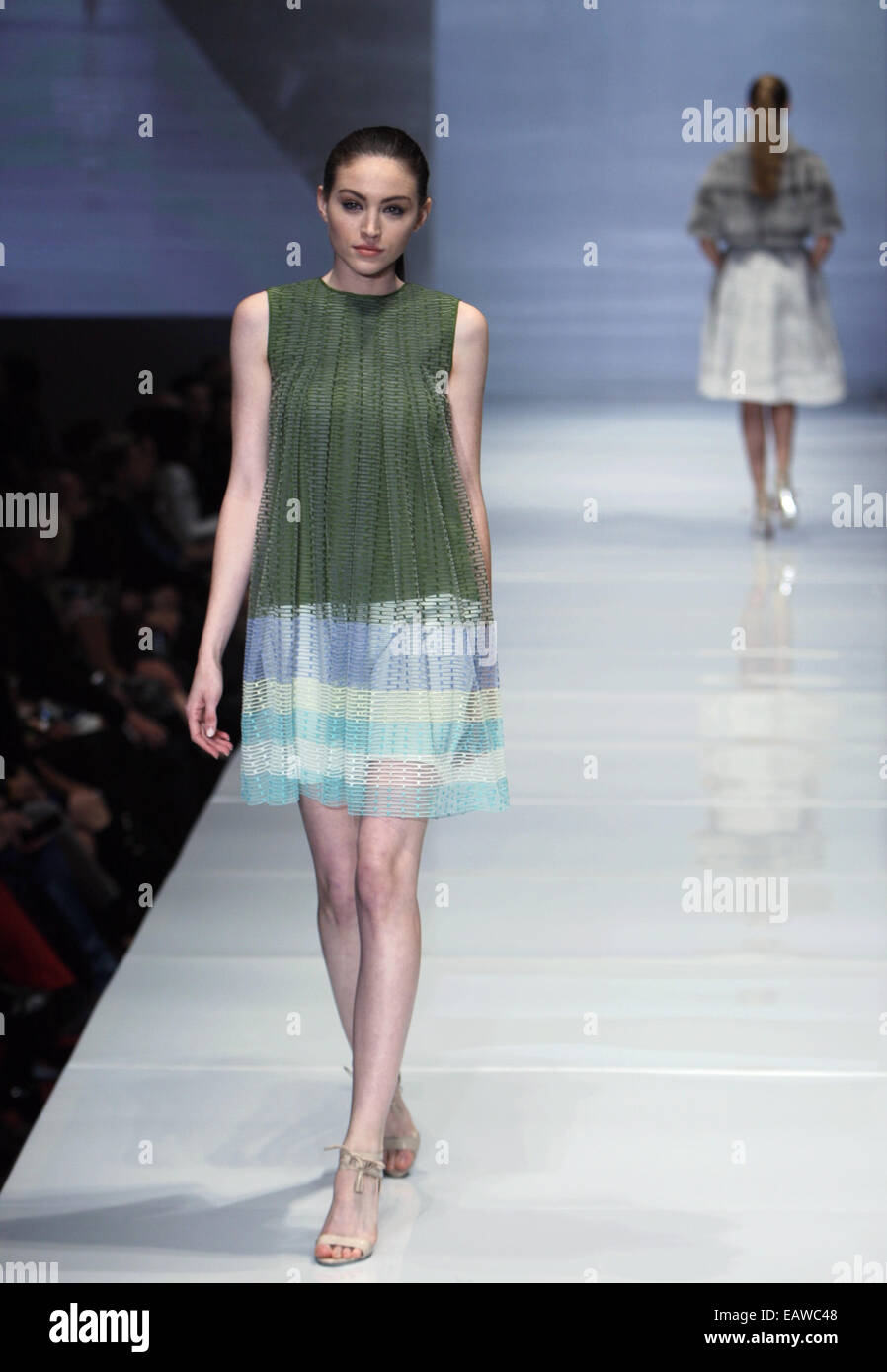 Houston, USA. 20th Nov, 2014. A model presents a creation of Rolando ...