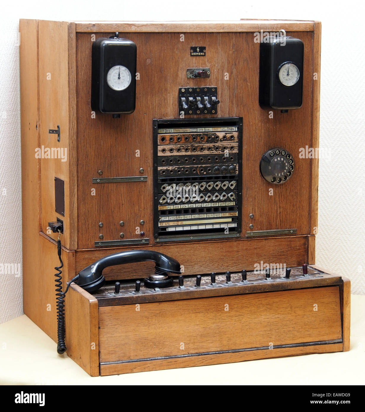 A Siemens telephone switch is displayed in the image. This device is ...