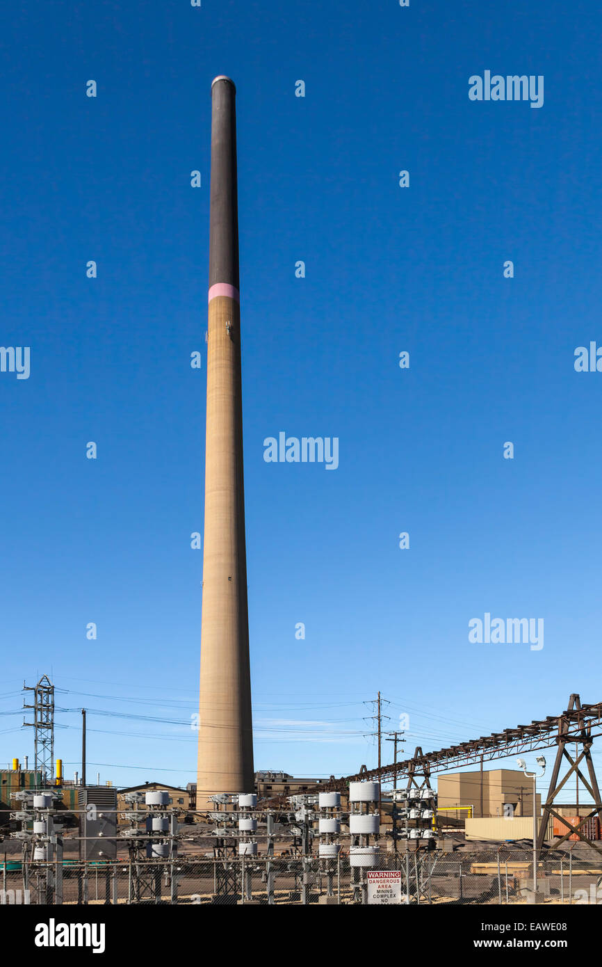 A tall smoke stack chimney at the Hudson's Bay Mining and Smelting Co ...