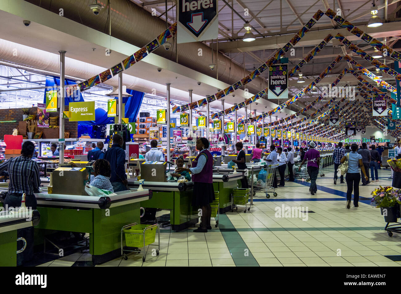 An enormous row of check-out cash registers in a supermarket mall Stock ...