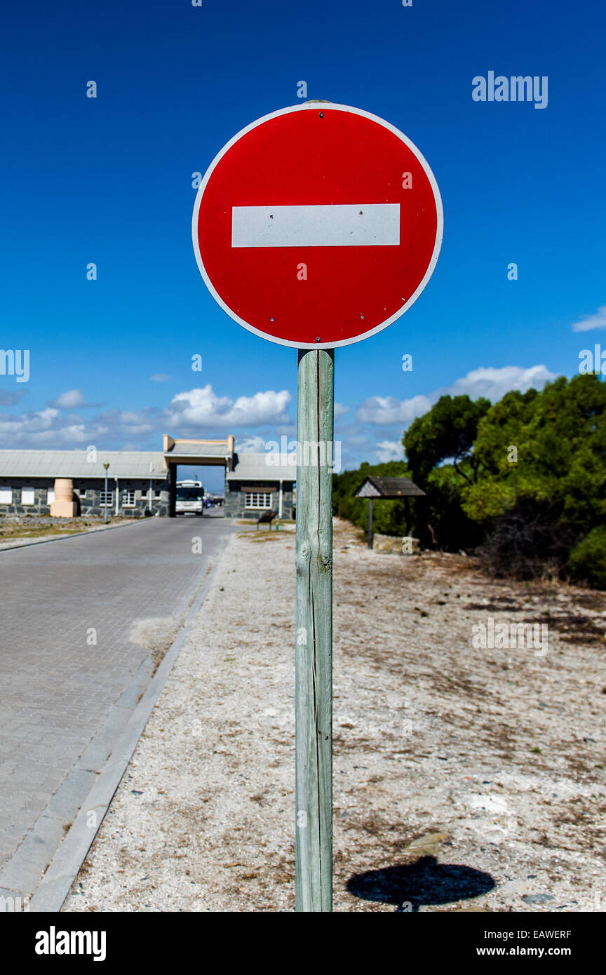 A bright red stop sign near the entrance to a prison museum Stock Photo ...