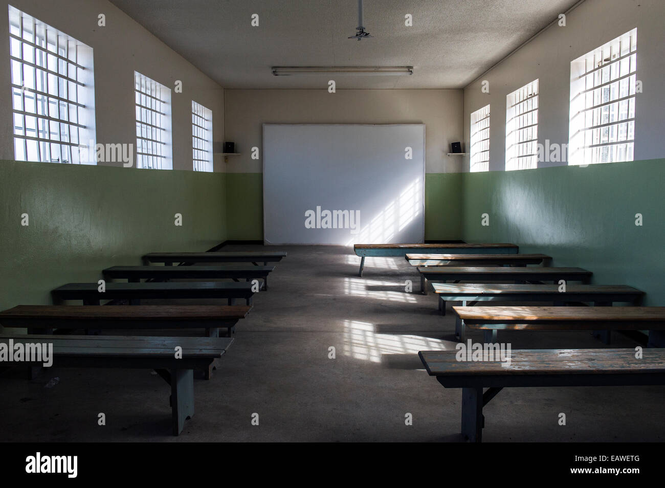Student benches in a classroom where prisoners were taught lessons ...