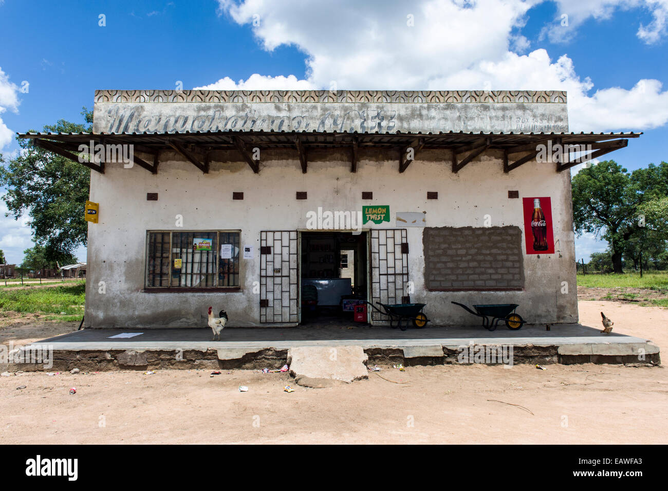 A general store replete with a chicken in a small African village Stock ...