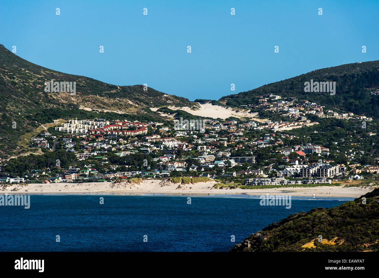 A coastal community in a sheltered bay surrounded by sand dunes Stock ...