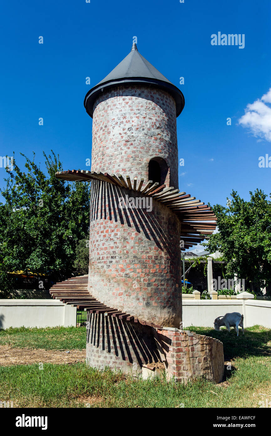 A domestic goat house in the shape of a castle turret spire Stock Photo ...