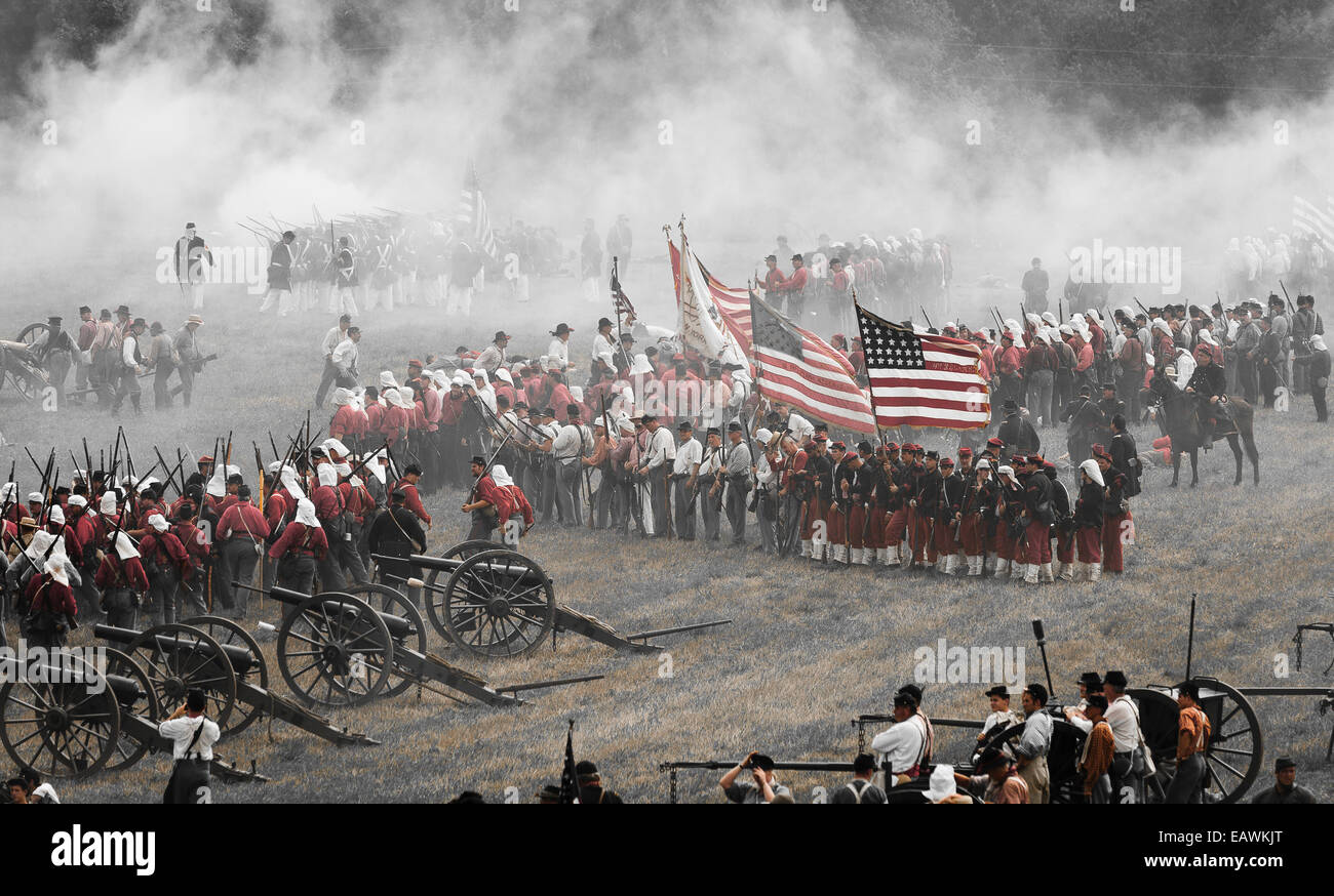 Smoke rises from the battlefield in a Civil War reenactment Stock Photo ...