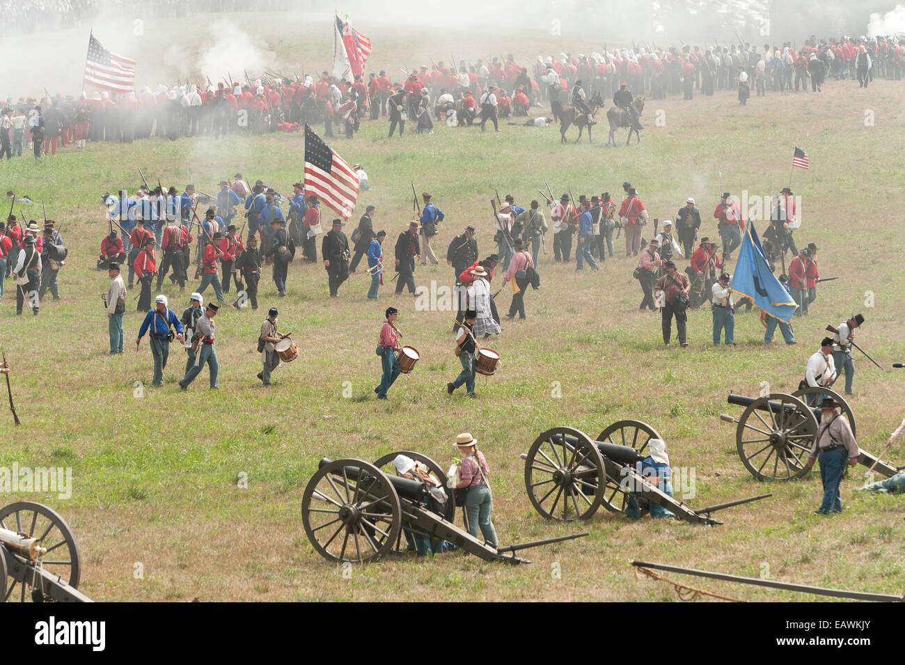 Smoke rises from the battlefield in a Civil War reenactment Stock Photo ...