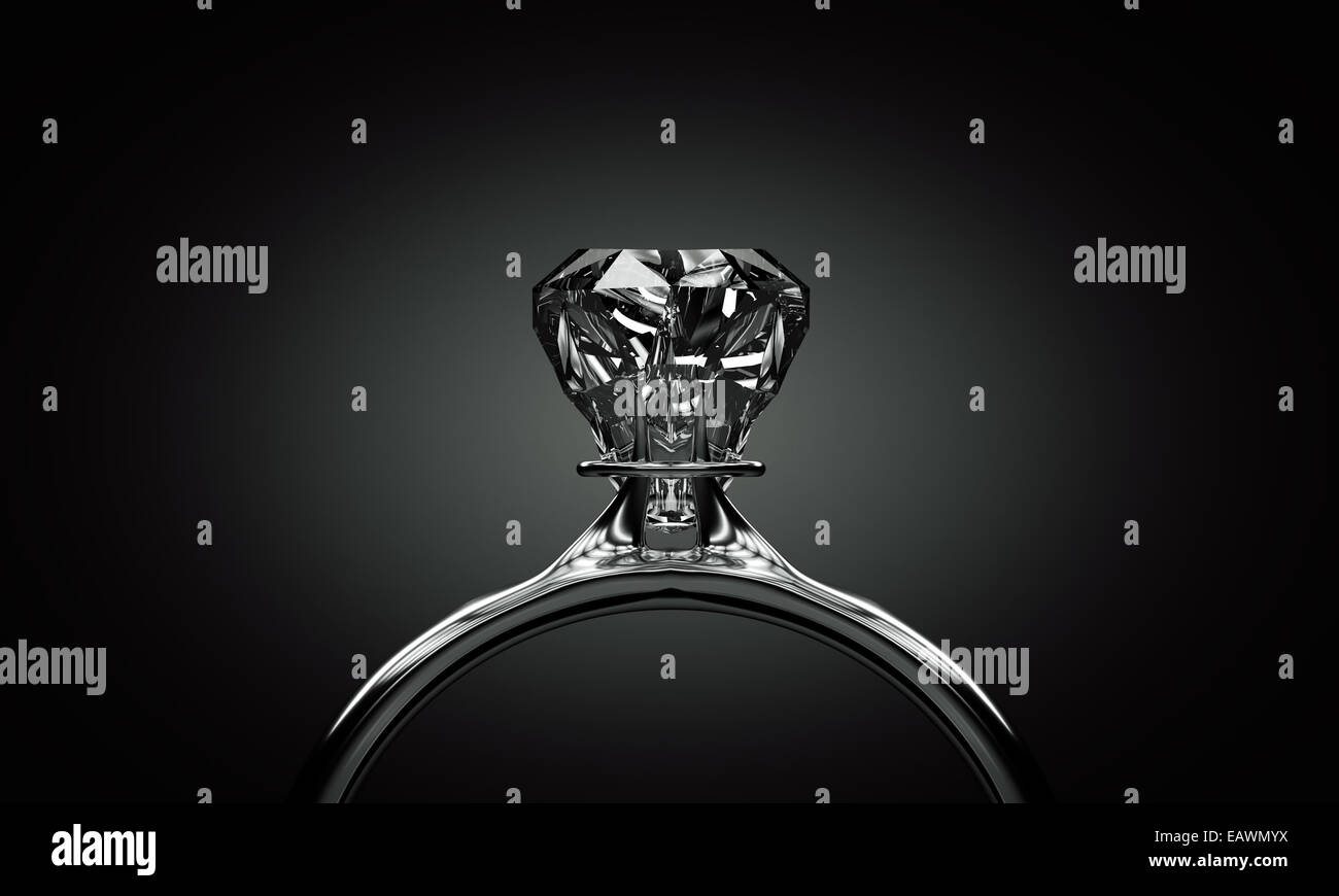 Shining ring with diamond in the darkness Stock Photo - Alamy