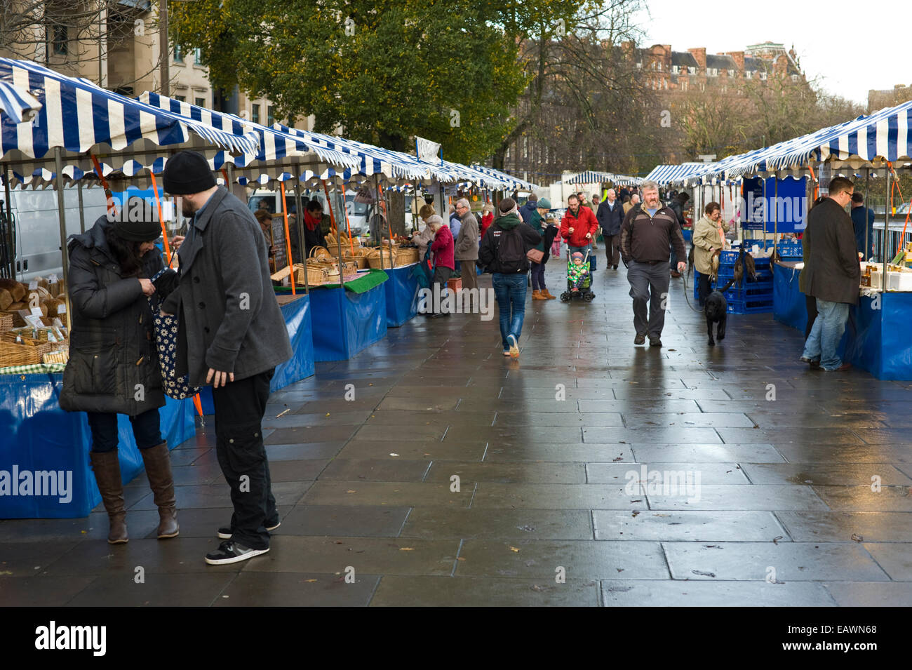 Customers browsing stalls at Edinburgh Farmers Market in city centre ...